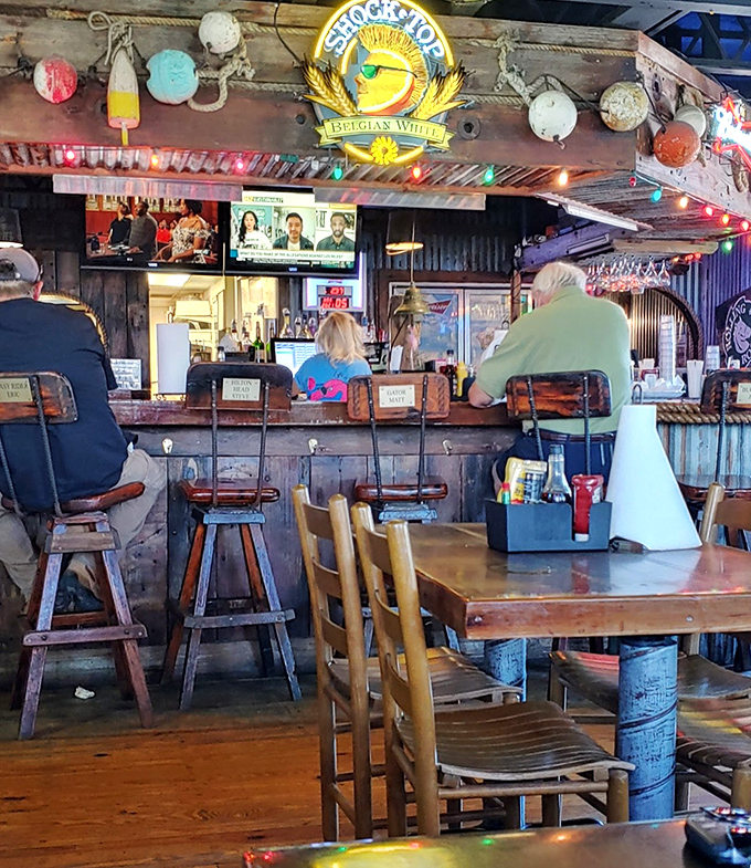 The neon Corona sign isn't just advertising&mdash;it's a lighthouse guiding thirsty travelers to a safe harbor of cold beverages.