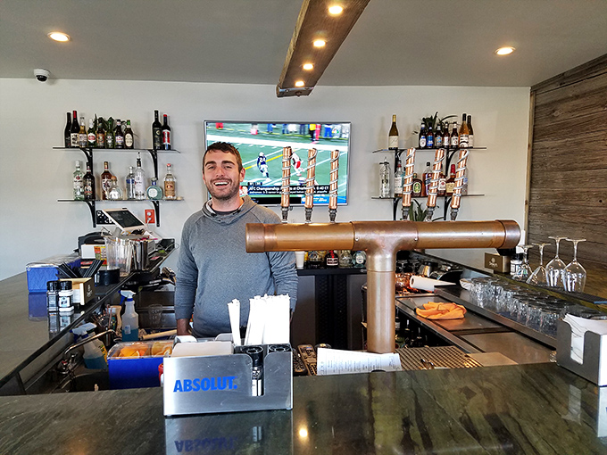 Behind every great bar is a bartender with that "I know exactly what you need" smile and a copper tap system that gleams like treasure.