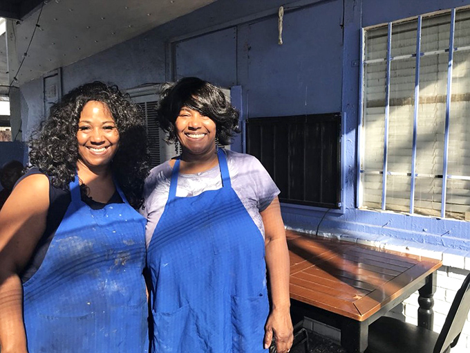 The staff at Tori's Place brings warmth and hospitality that matches the soulful food. Their blue aprons signal that serious cooking happens here.
