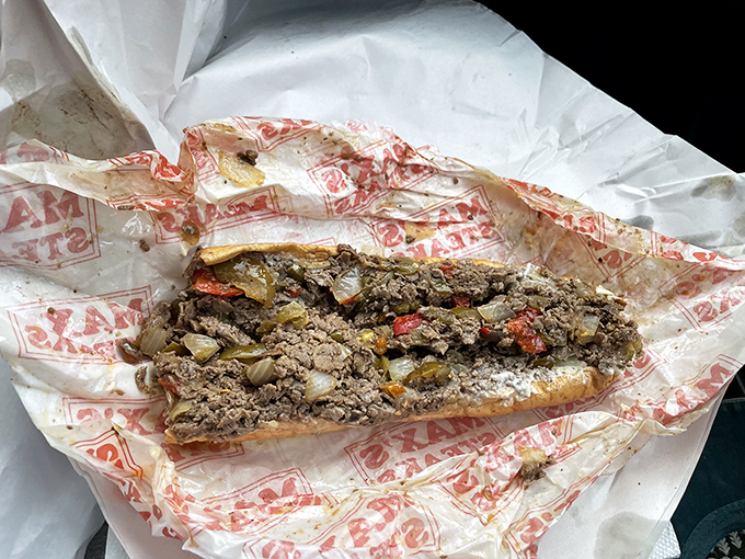 The perfect cross-section reveals the truth: this isn't just chopped steak and bread &ndash; it's an edible masterpiece of texture and flavor.