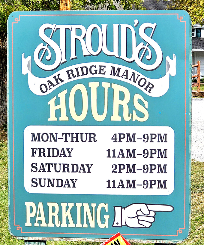 The hours sign stands as a beacon of hope for fried chicken pilgrims. Plan accordingly&mdash;this isn't fast food, it's food worth waiting for.