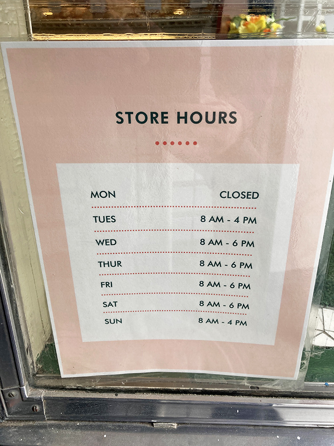 The store hours - crucial information for planning your sugar pilgrimage. Note Monday's closure: even wizards need rest.