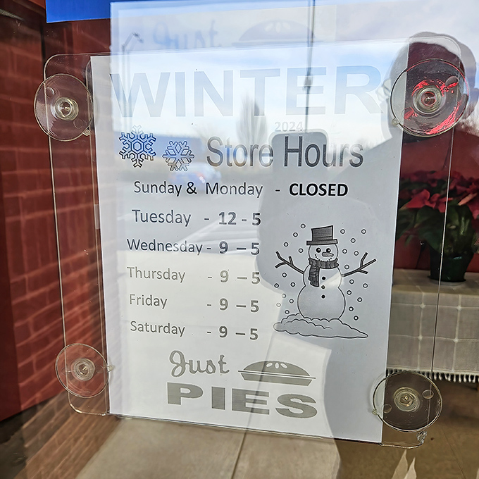 Winter hours posted clearly&mdash;crucial information for planning your pie pilgrimages during the colder months.