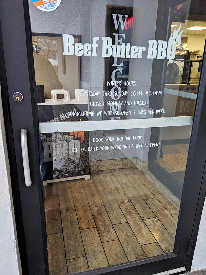 Winter hours posted clearly &ndash; because even in Wisconsin's frozen months, the primal need for proper BBQ doesn't hibernate.