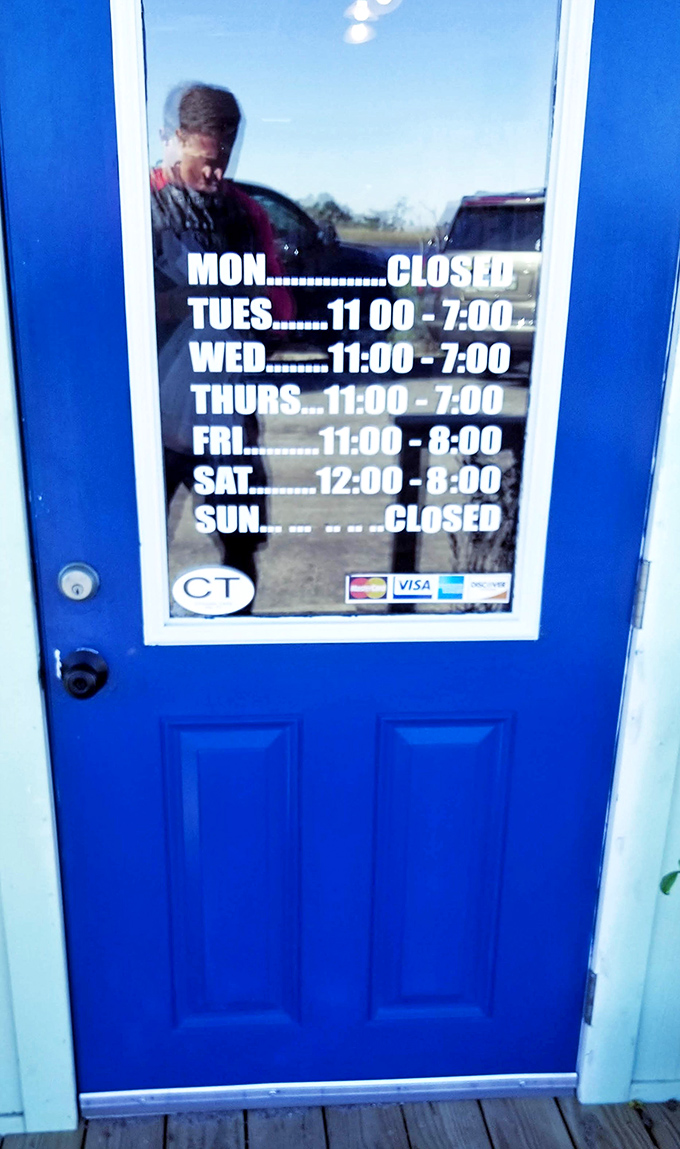 The blue door with hours posted is like a treasure map to deliciousness. Closed Mondays because even chowder artisans need a day off.