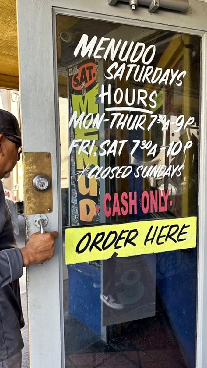 The door tells you everything you need to know: cash only, menudo on Saturdays, and closed Sundays. Food this good makes its own rules.