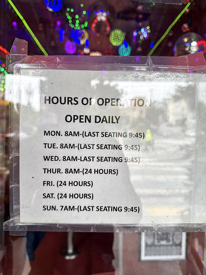 The hours sign reveals the holy grail of dining—those magical 24-hour periods when pancakes at midnight aren't just possible, but encouraged.