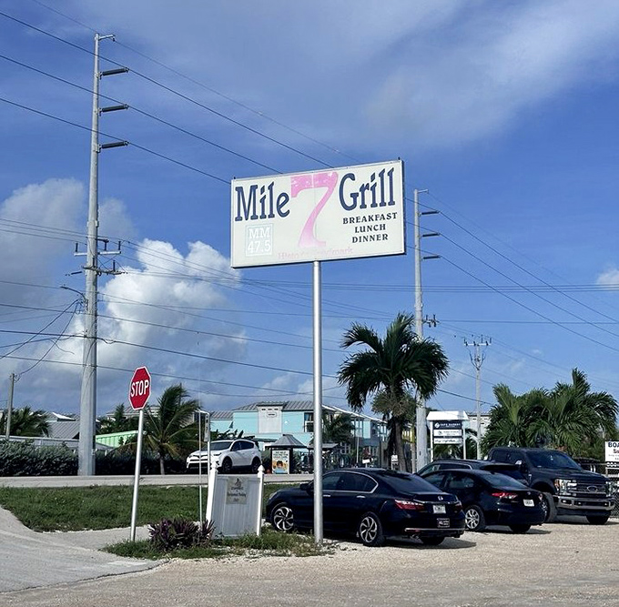The roadside sign stands tall against the Florida sky, a landmark that's guided hungry travelers to breakfast bliss for generations.