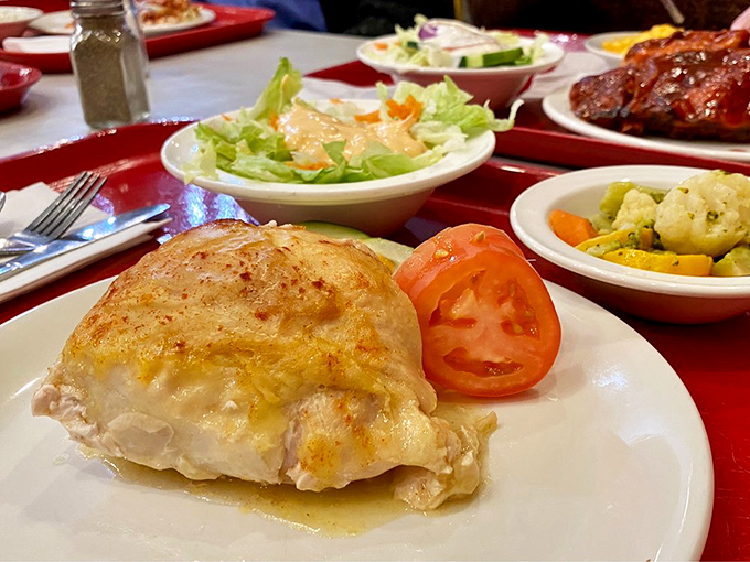 This stuffed chicken breast, glistening with savory sauce, is what happens when simple ingredients meet time-honored cooking techniques.