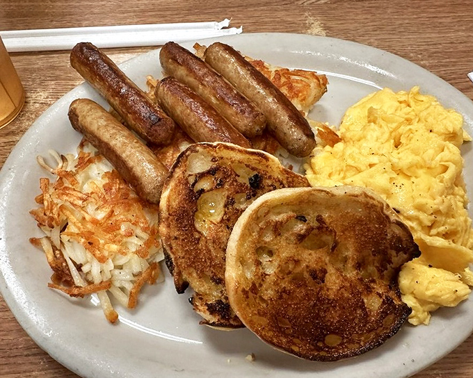 The breakfast platter that says "You won't need lunch today." Those pancakes aren't just golden discs&mdash;they're edible sunshine on a plate of morning perfection.