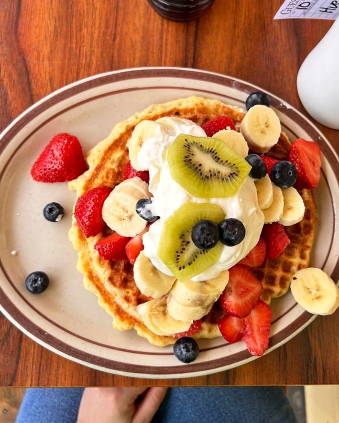 A waffle that's basically a fruit delivery system. Fresh berries, bananas, and kiwi make this almost &ndash; almost &ndash; too pretty to eat.