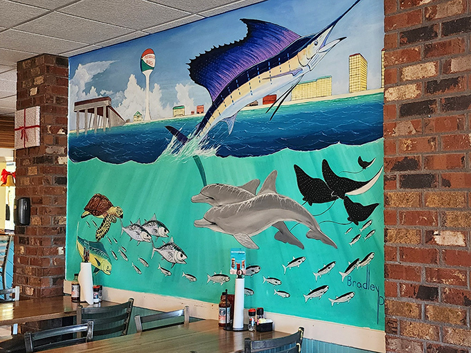 That mural brings the Gulf right inside &ndash; dolphins, marlins, and the promise of fresh catches.