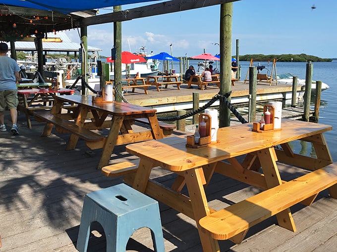Picnic tables with million-dollar views. No white tablecloths needed when you're dining inches from where your dinner was swimming.