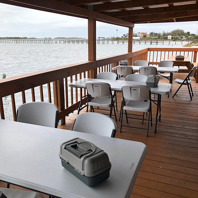 The waterfront deck isn't just outdoor seating—it's front-row tickets to nature's best show, with water views that rival the food for attention.