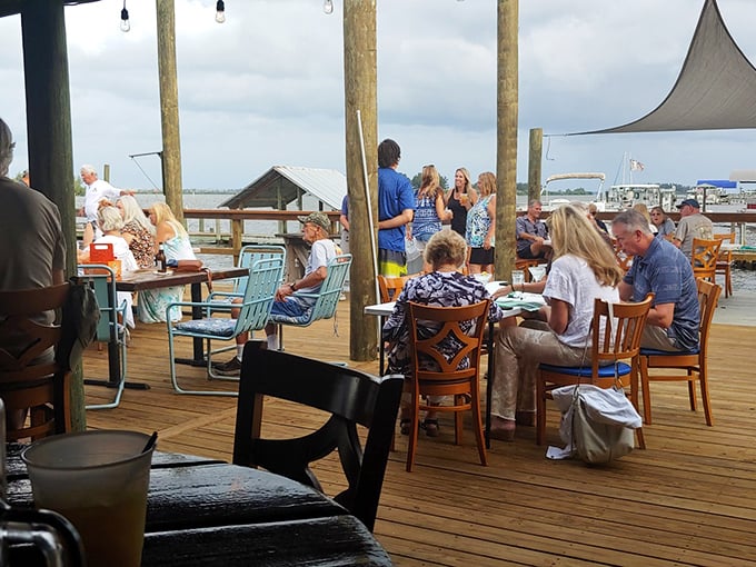 Waterfront dining where the gentle breeze carries both the scent of salt water and the promise of seafood that was swimming this morning.