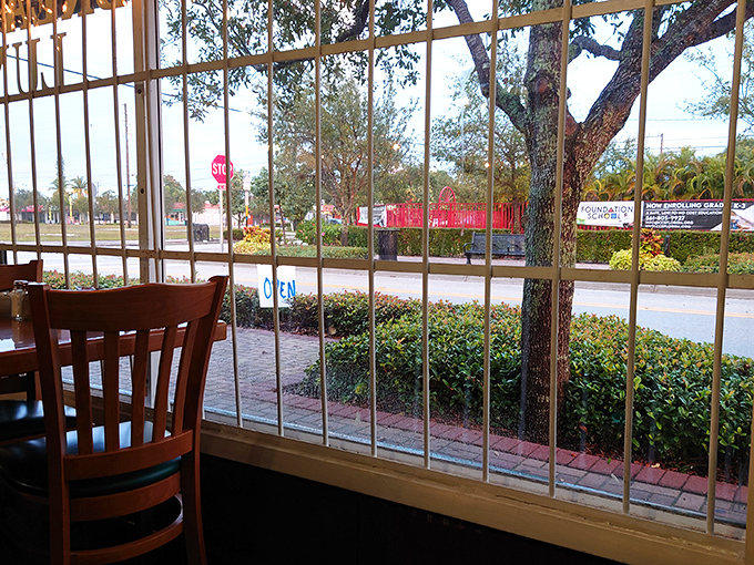 Window seats offer prime people-watching with your pancakes - a front-row view to West Palm Beach's morning parade.