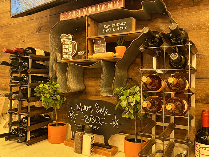 "Girls Just Wanna Have Wine" sign speaks universal truth. The "Miami Style BBQ" chalkboard hints at the cross-cultural smoke adventure awaiting you.