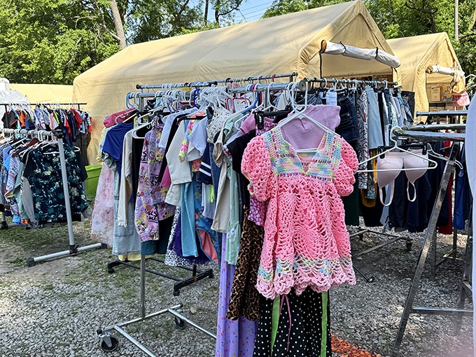 Clothing racks bursting with possibility&mdash;that pink crochet dress might be someone's future vintage find in another thirty years.