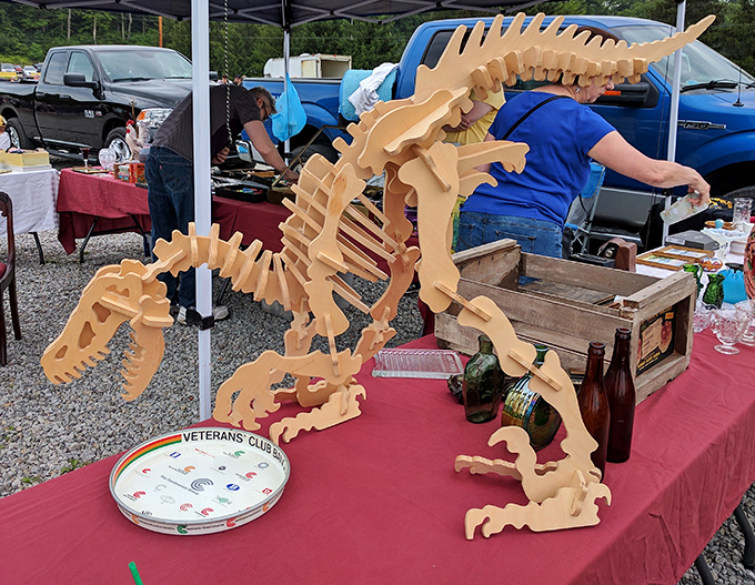 Jurassic craftsmanship that would make Jeff Goldblum nervous. This wooden velociraptor proves flea markets aren't just about the past—they're about imagination.