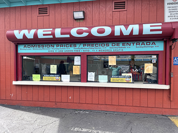 The gateway to bargain paradise, where admission prices are posted in two languages. Your ticket to a world where haggling isn't just allowed—it's expected.