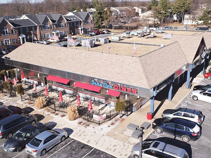 From above, the diner's distinctive roof and layout reveal its place in the community—a gathering spot nestled among everyday life in Manassas.
