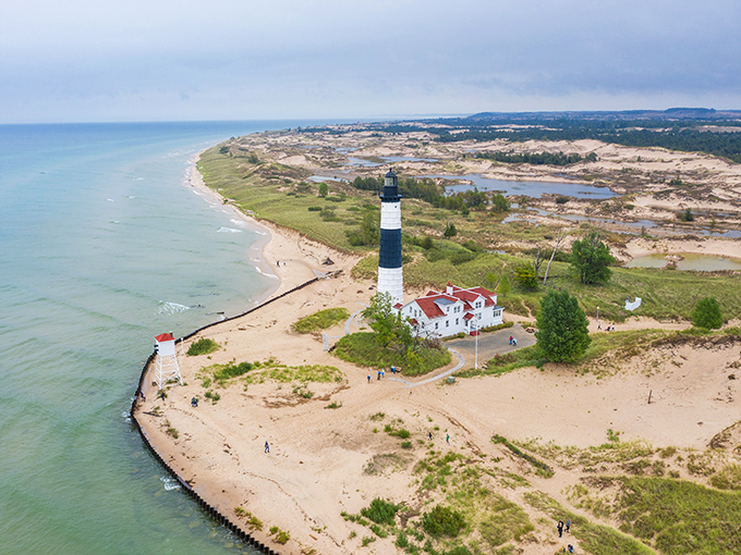 Bird's eye perfection: the aerial view reveals Big Sable's strategic position between the vast lake and the wild dune landscape.
