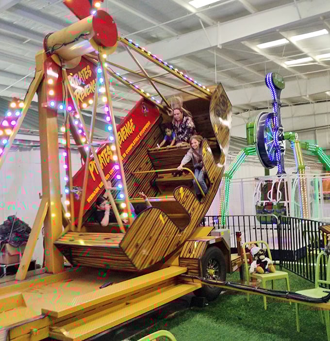 Carnival thrills without the county fair wait times! This mini-amusement area proves that sometimes the best shopping breaks involve spinning until slightly dizzy.