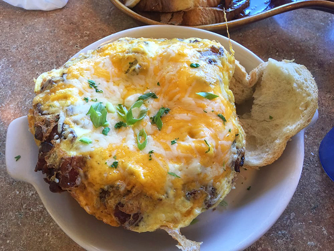 This isn't just breakfast—it's architecture. Layers of flavor built with the precision of Frank Lloyd Wright, if he'd worked exclusively in eggs.