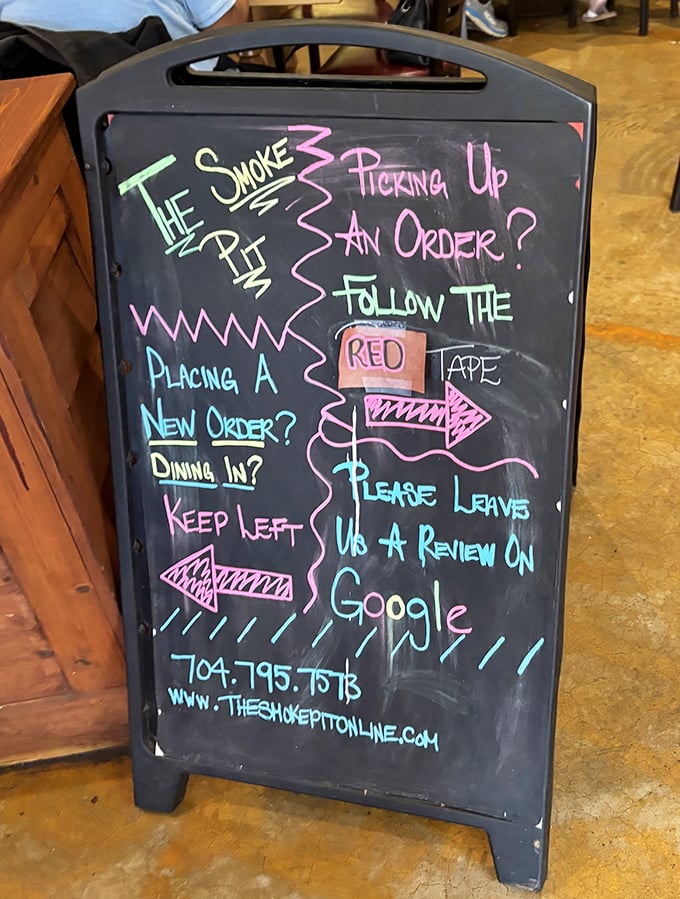 Friendly guidance board showing this place cares about customer experience as much as perfect barbecue.