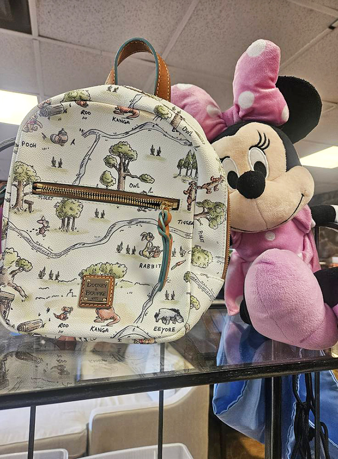Winnie the Pooh meets modern fashion in this adorable mini backpack. A hundred-acre bargain with Minnie Mouse keeping watch nearby.