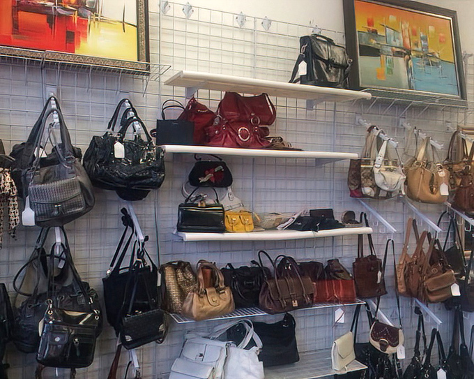 Handbag heaven for the fashion-forward bargain hunter. That red leather number could easily become the star of your accessory collection.