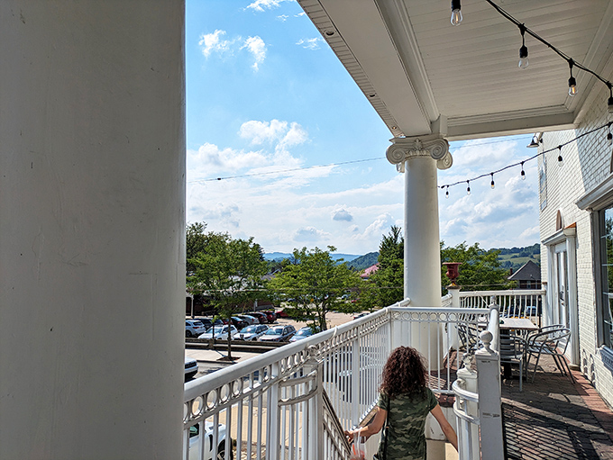 The balcony view offers a glimpse of Ligonier's charm—the perfect backdrop for that "I'm somewhere special" feeling that elevates any meal.