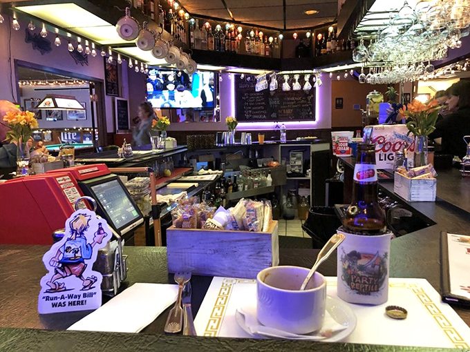 The bar area buzzes with friendly energy, cold beer, and the kind of atmosphere that turns strangers into friends.