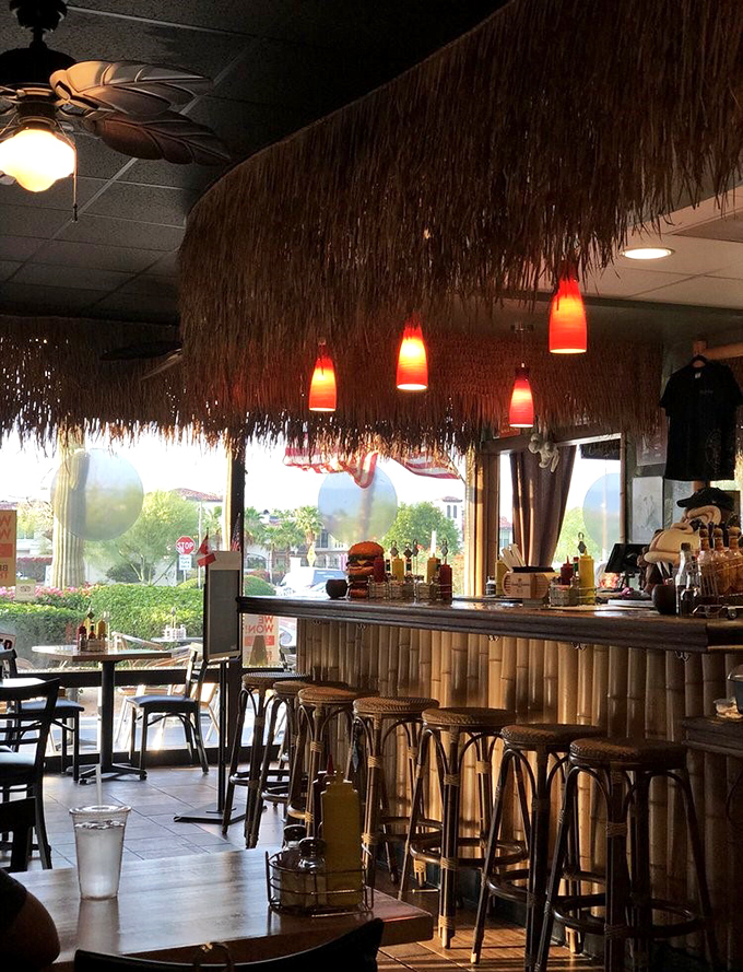 Tiki bar meets burger haven. The bamboo-lined counter and pendant lights create the perfect atmosphere for serious eating with a side of fun.