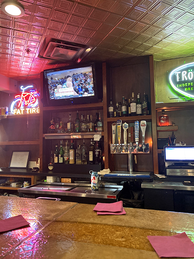 The bar area strikes that perfect balance between "sports bar casual" and "I can still have an adult conversation here" with local brews on tap.