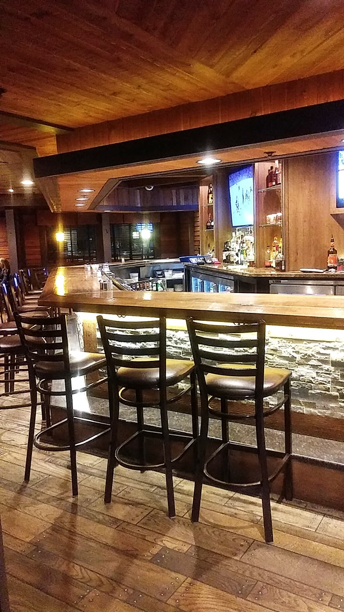 The bar's illuminated stone facade creates the perfect backdrop for an evening of Michigan craft beers and unexpected culinary delights.