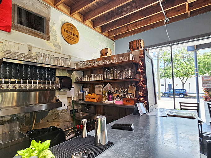 The bar area whispers promises of barrel-aged goodness and tap handles that pour liquid happiness into perfectly chilled glasses.