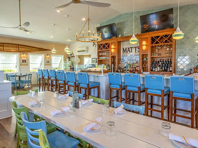 Bright blue chairs and coastal colors create a dining room that feels like a stylish friend's beach house&mdash;one where the friend happens to be an incredible chef.