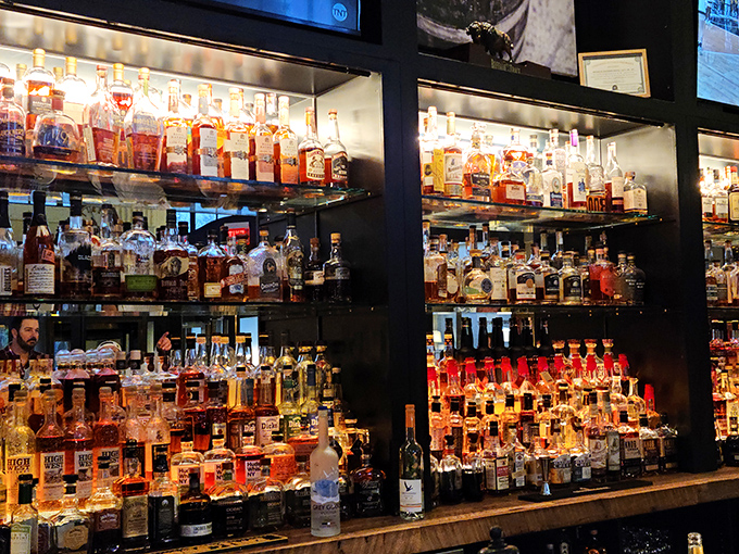 The impressive bar showcases an array of spirits that would make even the most discerning cocktail enthusiast nod in approval&mdash;liquid history on display.