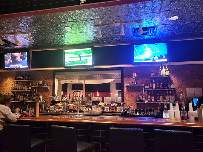 The bar area where conversations flow as smoothly as the perfectly crafted cocktails being served.