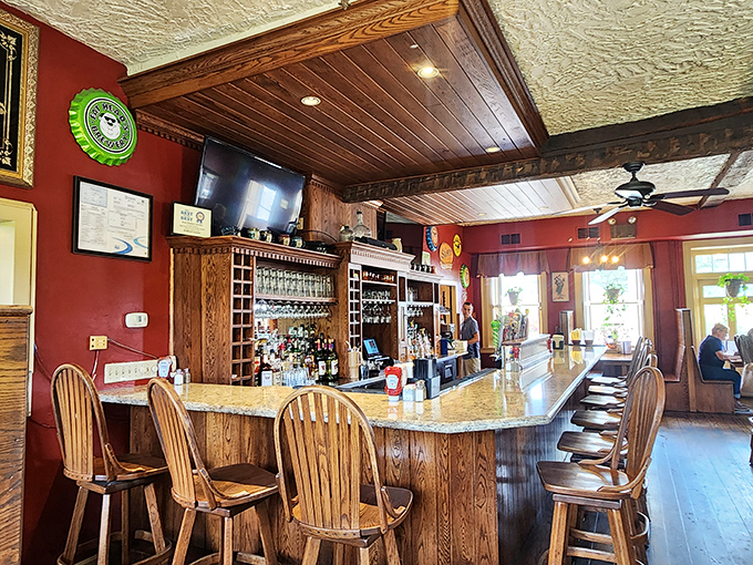 The bar's warm wood tones and marble countertop invite you to pull up a stool and settle in for stories both historic and newly created.