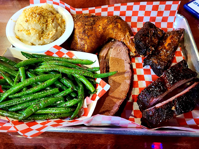 A BBQ sampler that covers all the bases&mdash;from smoky ribs to perfectly seasoned green beans. This isn't a meal; it's a meat-lover's fantasy league.
