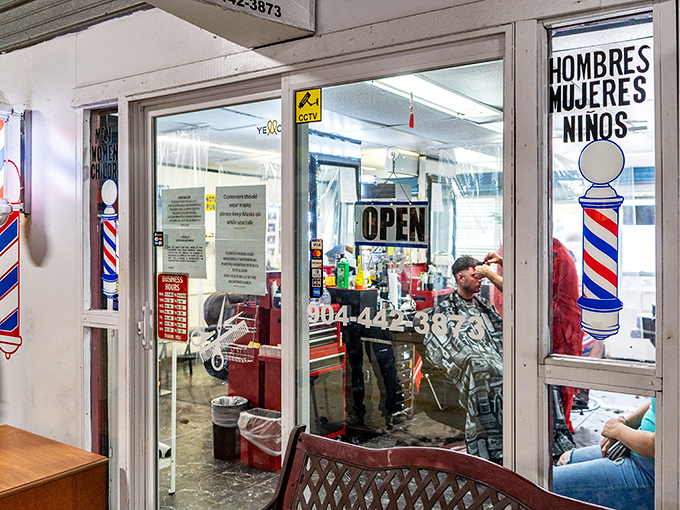 Old-school barbershop charm meets practical necessity. Where else can you get a fresh cut while your spouse hunts for vintage treasures? 