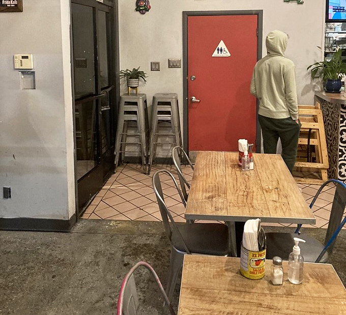 Even the hallway feels like part of the experience – a brief intermission before returning to your regularly scheduled feast.