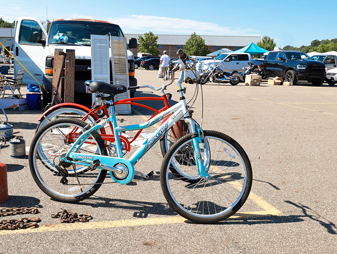 Even the outdoor section holds treasures, like this turquoise bicycle waiting to cruise neighborhood streets again. Someone's summer adventure is parked right here.