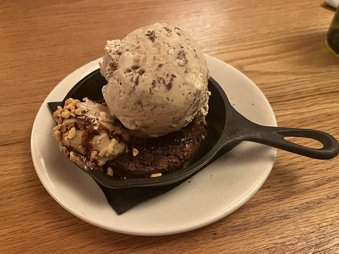 A skillet brownie that arrives with a warning: moments of pure chocolate bliss may cause involuntary sounds of delight.