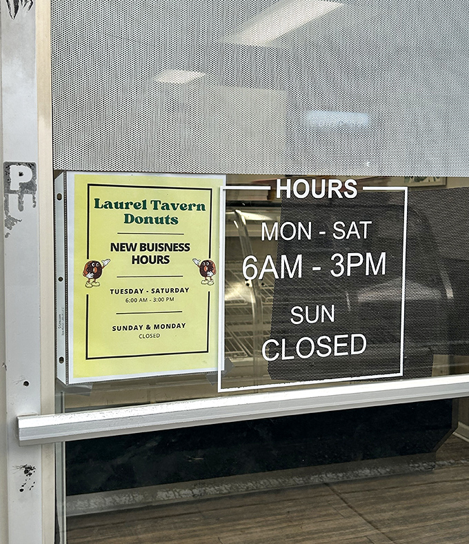 The hours sign tells you everything you need to know: rise early or miss out. In the donut world, the early bird gets more than just the worm.