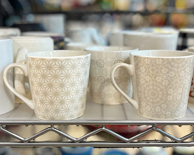 Mugs with personality waiting for their morning coffee assignment. That perfect hand-to-handle fit is somewhere in this ceramic collection.
