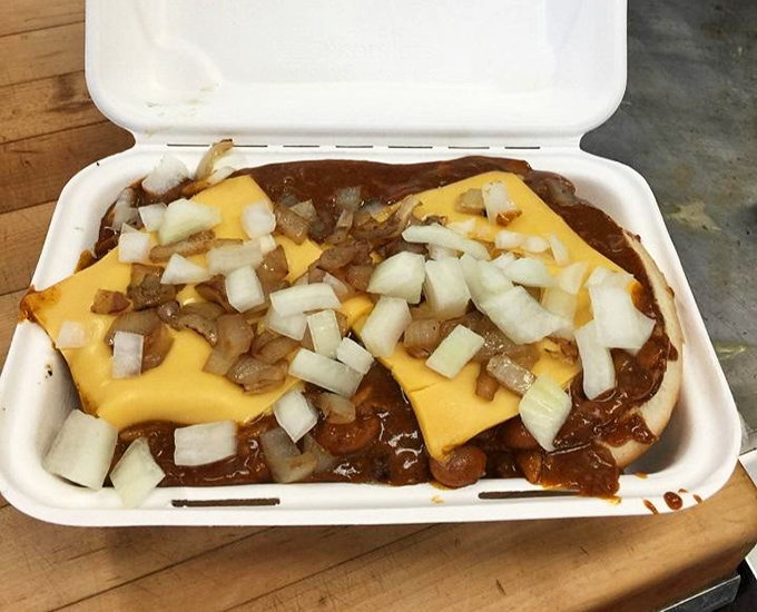 Chili cheese magnificence that requires strategic planning and extra napkins. Not first-date food unless you're testing their worthiness.
