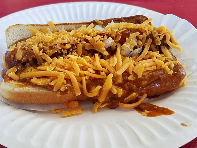The chili dog arrives gloriously messy, topped with a snowdrift of cheese - a beautiful reminder that the best foods don't photograph well for Instagram.
